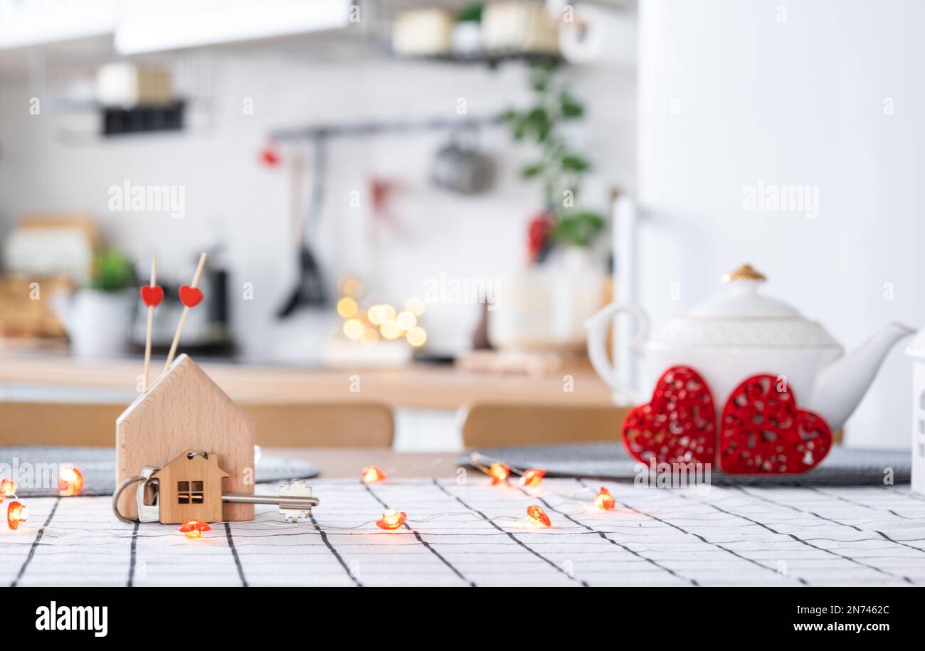 Key to house of cozy home with Valentine decor on table of kitchen ...