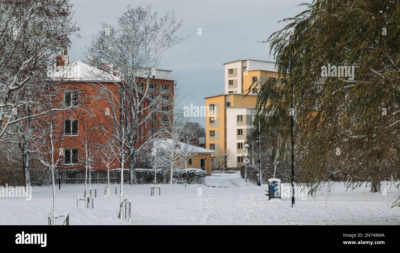 A wide angle of the orange stone building with beautiful snow-covered ...