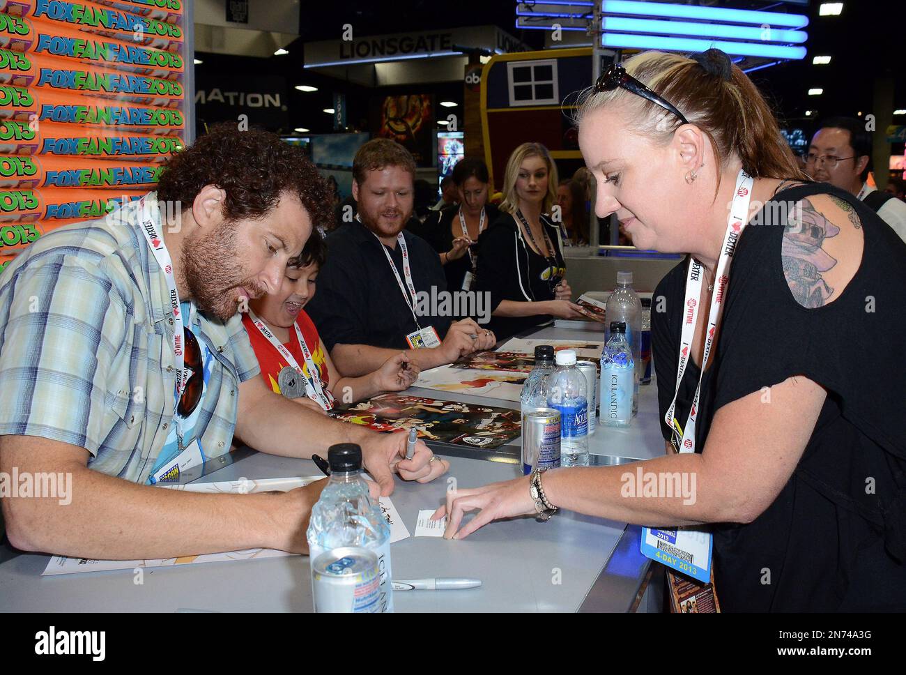 Cast member Dave Jeser signs autographs at the FOX "Animation ...