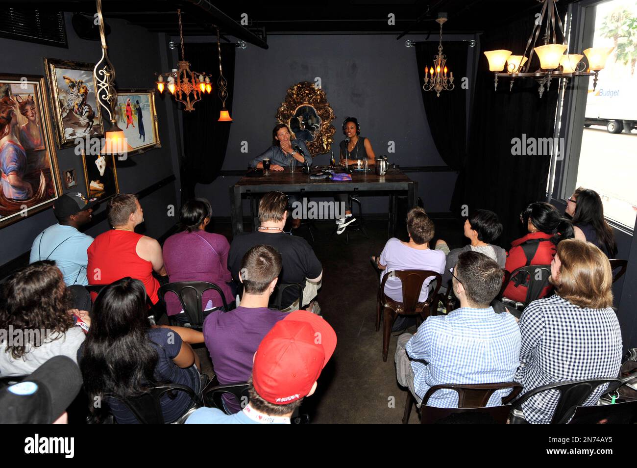 Actor Jared Padalecki talks with Aisha Tyler during a pod cast ...