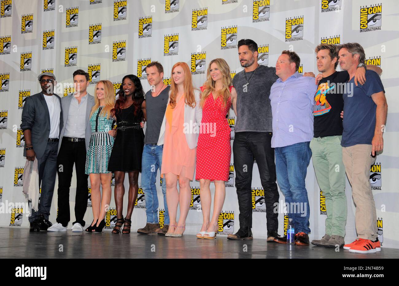 Cast members of "True Blood" line up for a photo after their panel on ...