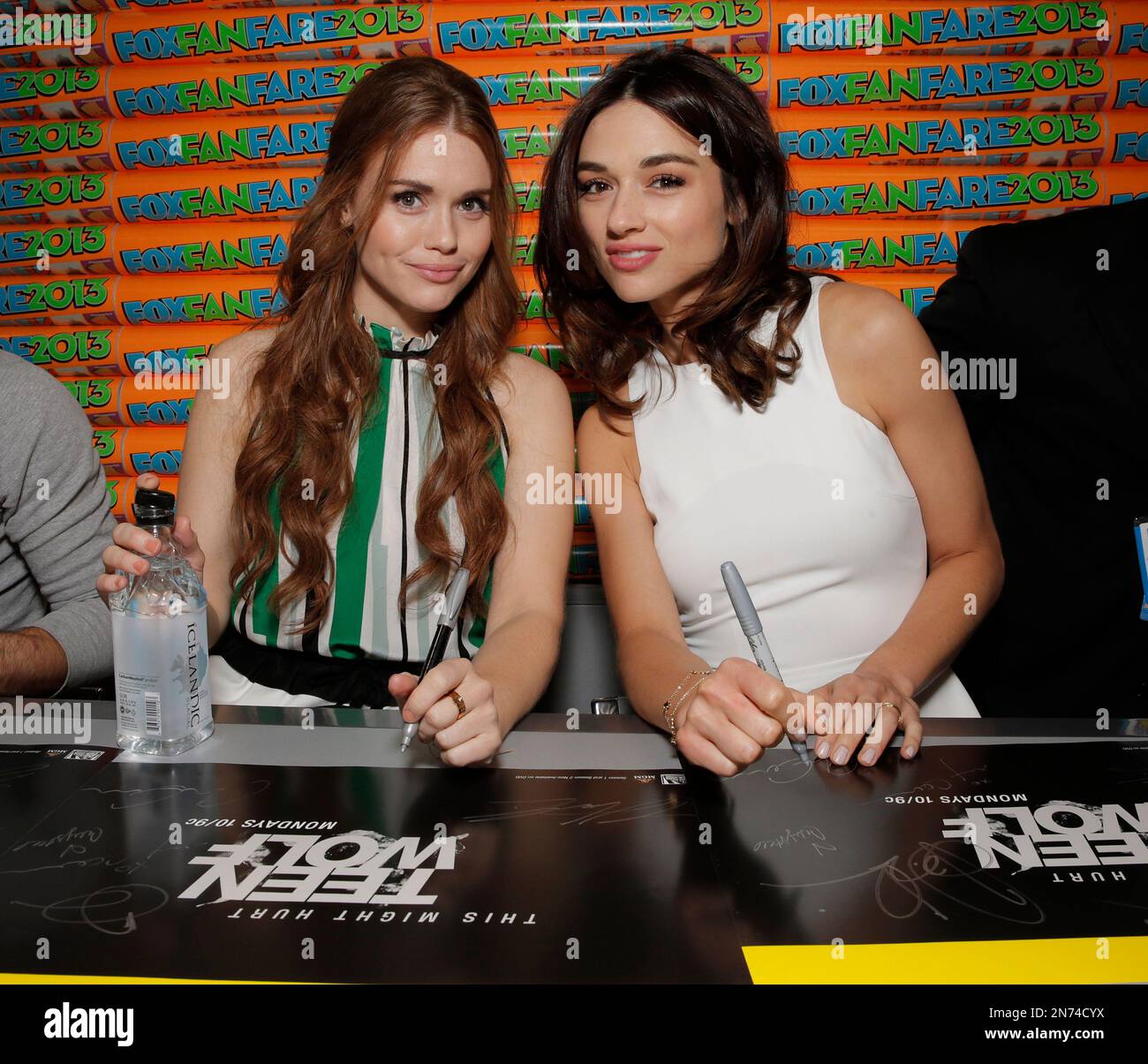 Actresses Holland Roden and Crystal Reed sign autographs at the "Teen ...