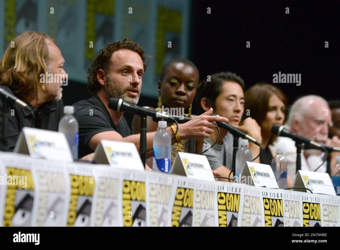 Andrew Lincoln, second left, and the cast and crew of "The Walking Dead ...