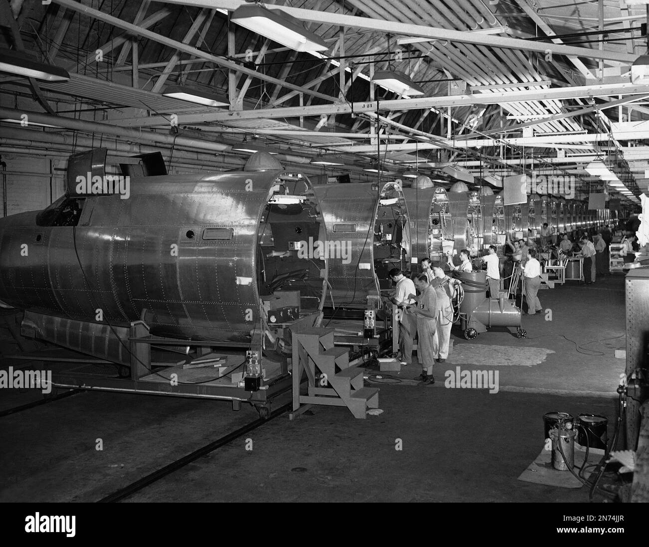 FILE - In this July 19, 1942 file photo, employees at the Chrysler ...