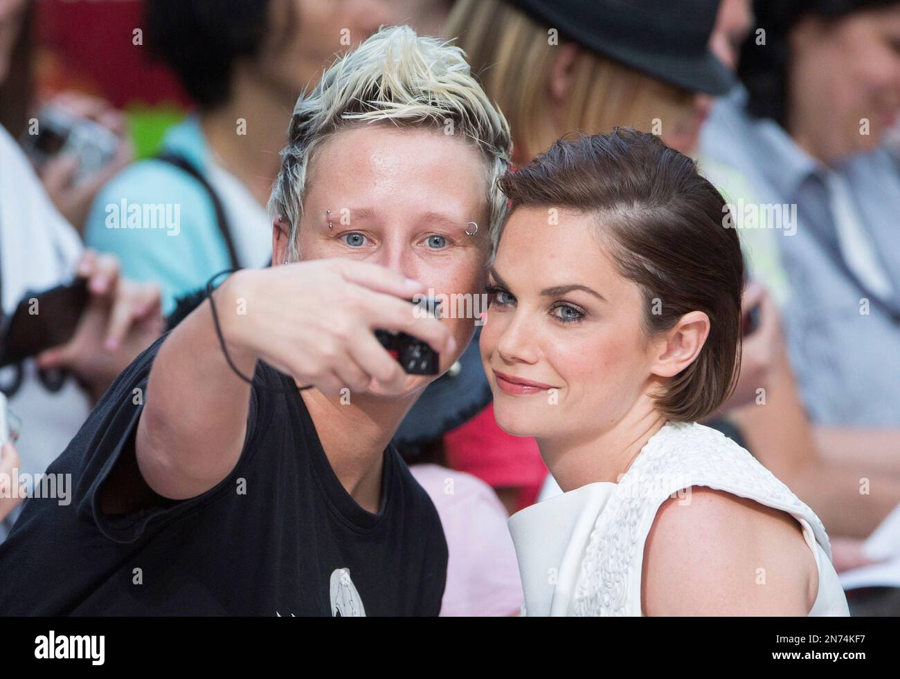 British actress Ruth Wilson, right, poses for a snapshot with a ...