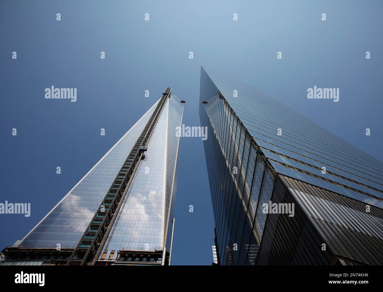 One World Trade Center, left, and 7 WTC are shown in New York ...
