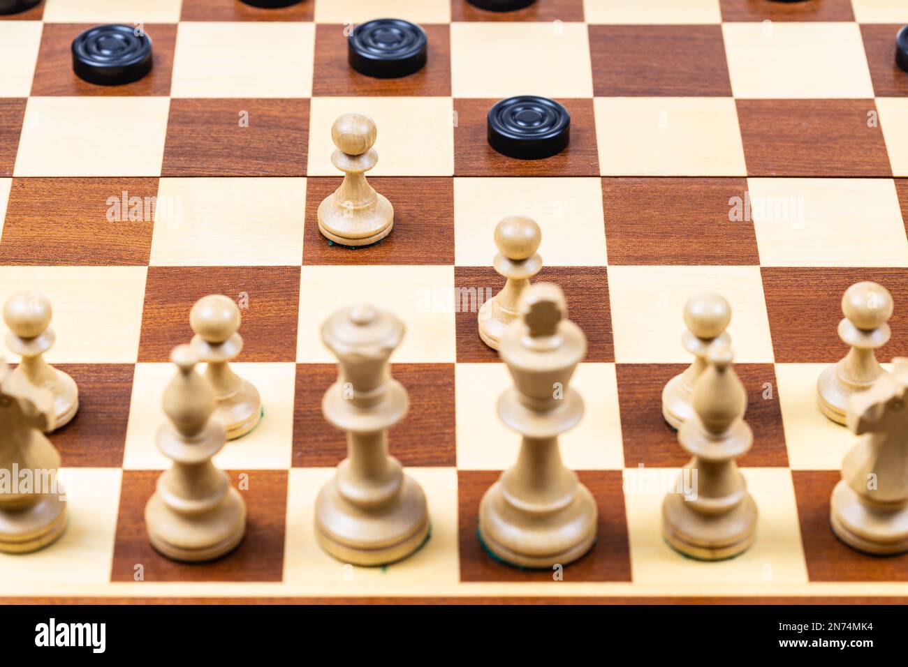 playing by different rules on the same board - black checkers and white ...