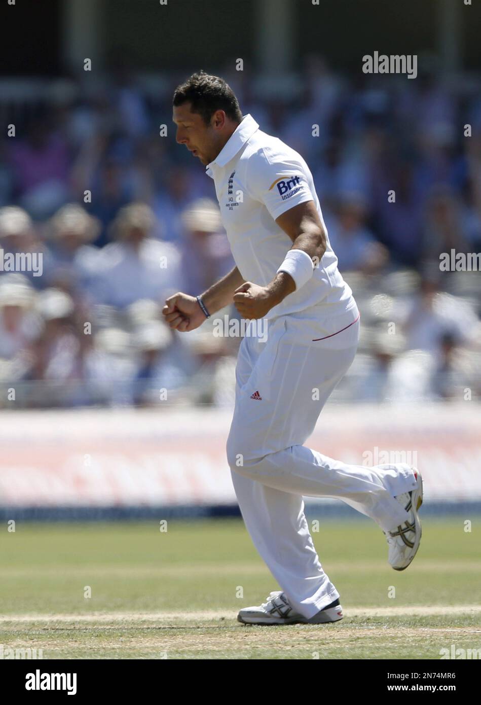 England's Tim Bresnan celebrates the wicket of Australia's Phillip ...