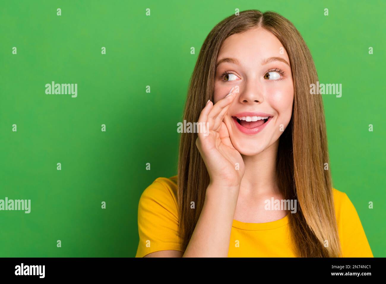 Closeup photo of young teen school girl hold palm cheek talking empty ...