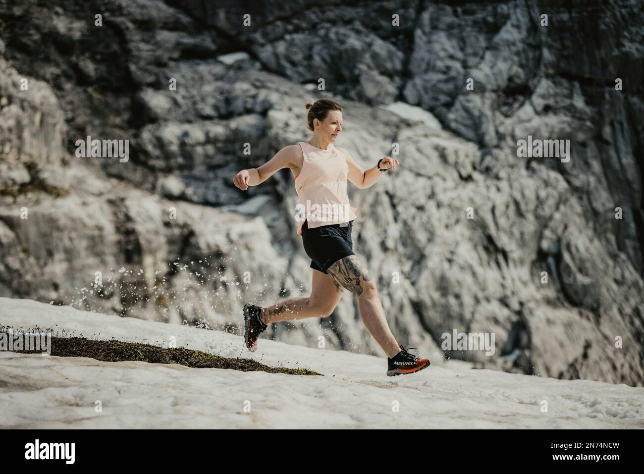 Woman on a great trail running around the Schachenhaus of King Ludwig ...