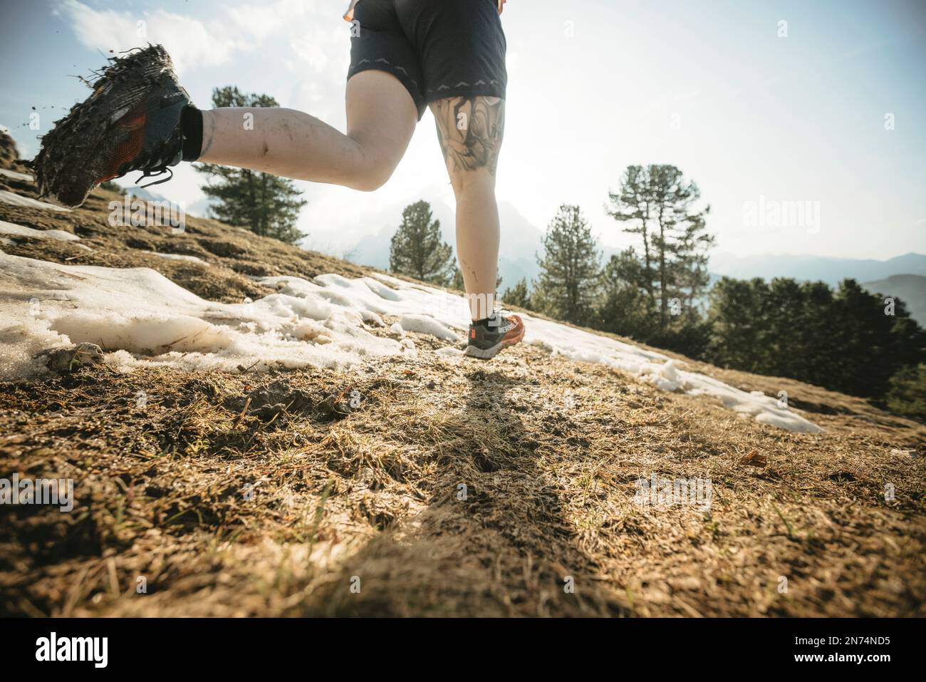 Woman on a great trail running around the Schachenhaus of King Ludwig ...