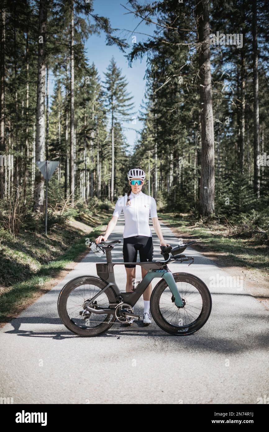 Professional triathlete with her time trial bike / Time Trial Bike in ...
