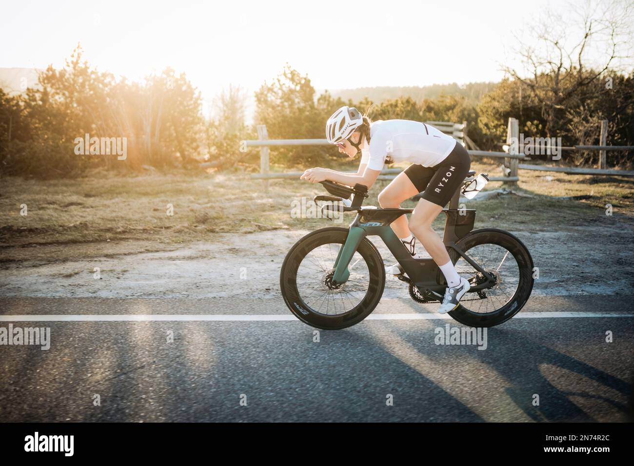 Professional triathlete on her time trial bike / Time Trial Bike in ...