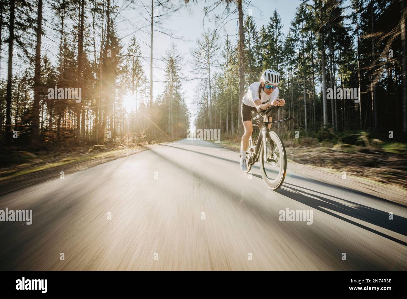 Professional triathlete on her time trial bike / Time Trial Bike in ...