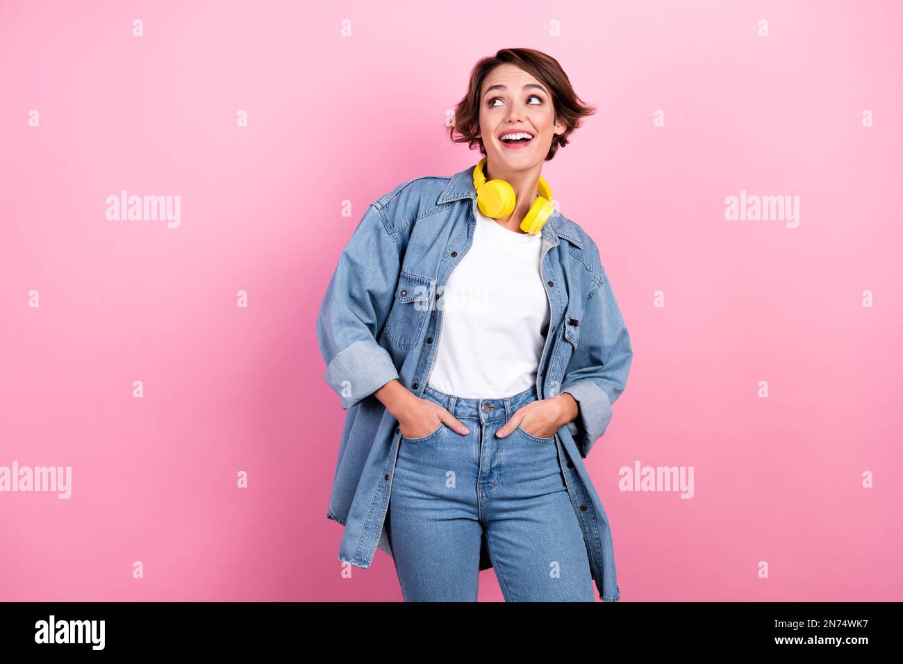 Photo of dreamy hipster promoter music lover girl wearing denim outfit ...