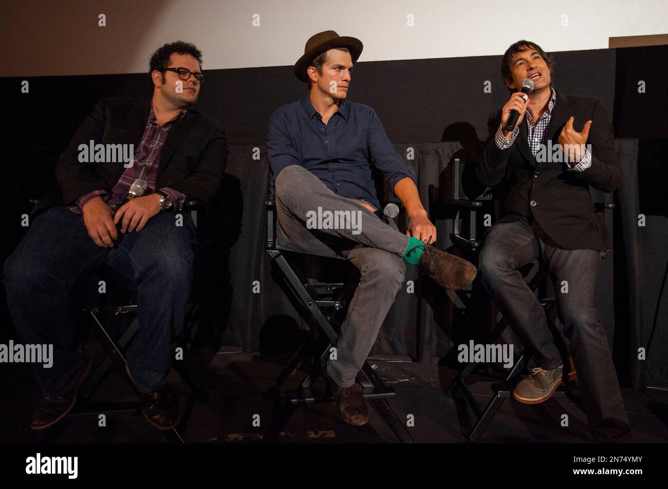 Actors Josh Gad, Ashton Kutcher and director Joshua Michael Stern seen ...