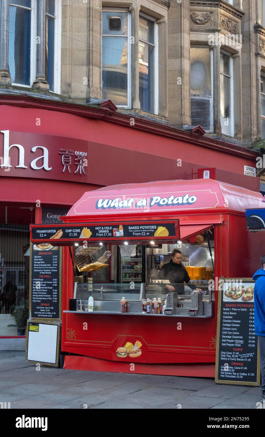 What a Potato food stand in Manchester UK Stock Photo - Alamy