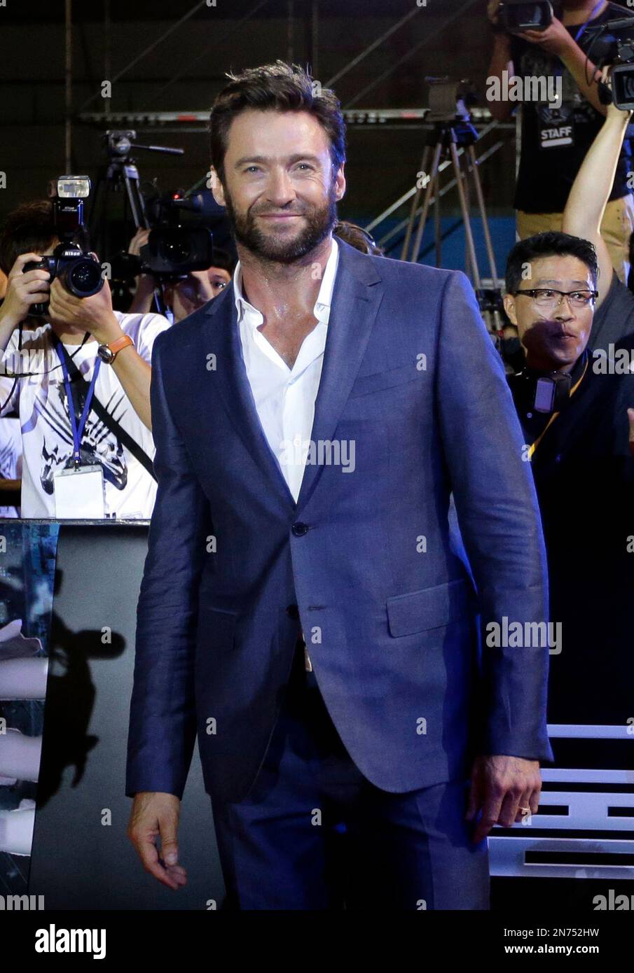 Actor Hugh Jackman poses for the media during the premiere event of his ...