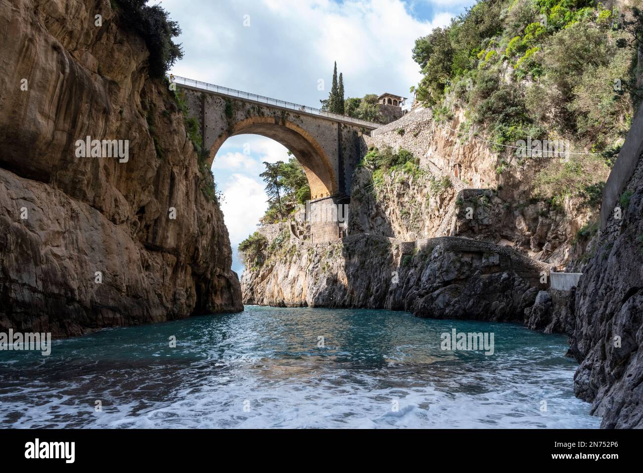 Scenic arch bridge at the Fjord of Fury, Amalfi Coast of Southern Italy ...