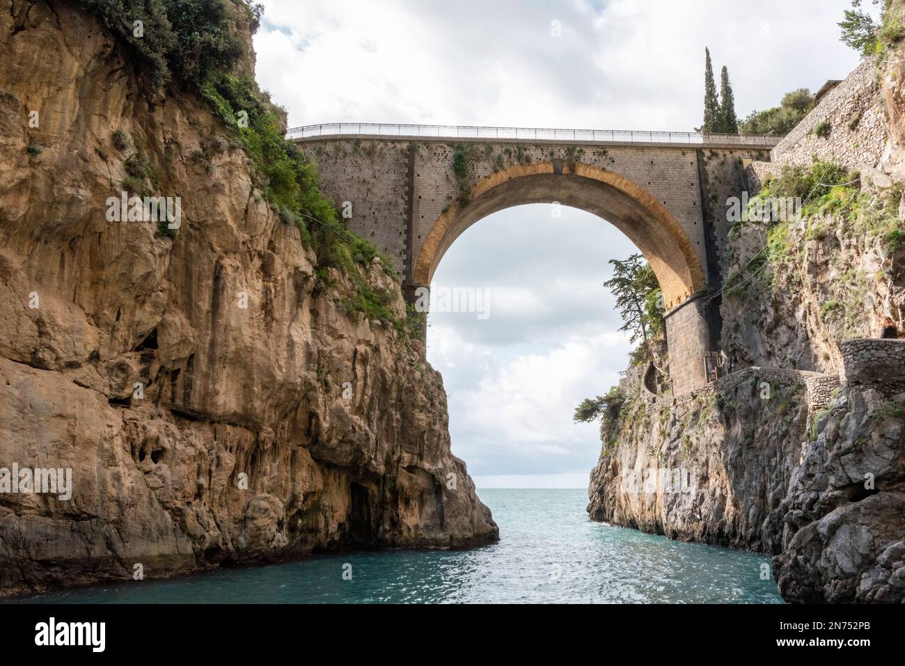 Scenic arch bridge at the Fjord of Fury, Amalfi Coast of Southern Italy ...