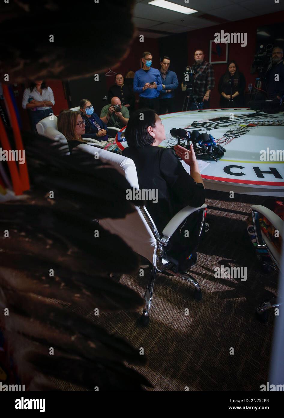 Cathy Merrick, centre, Grand Chief of the Assembly of Manitoba Chiefs ...