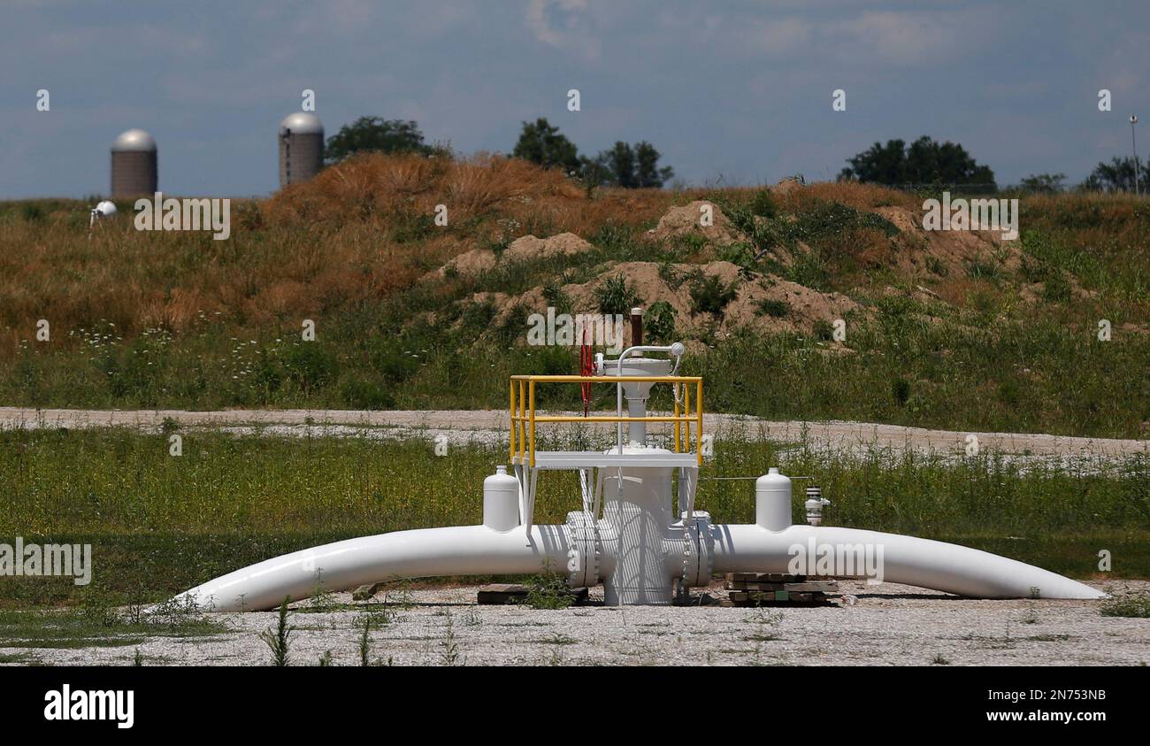 A valve extends above ground at the Enbridge Key Terminal near ...