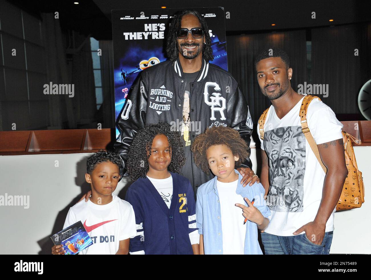 Snoop Dogg, at left, Ray J, and moviegoers attend the Snoop Dogg and ...