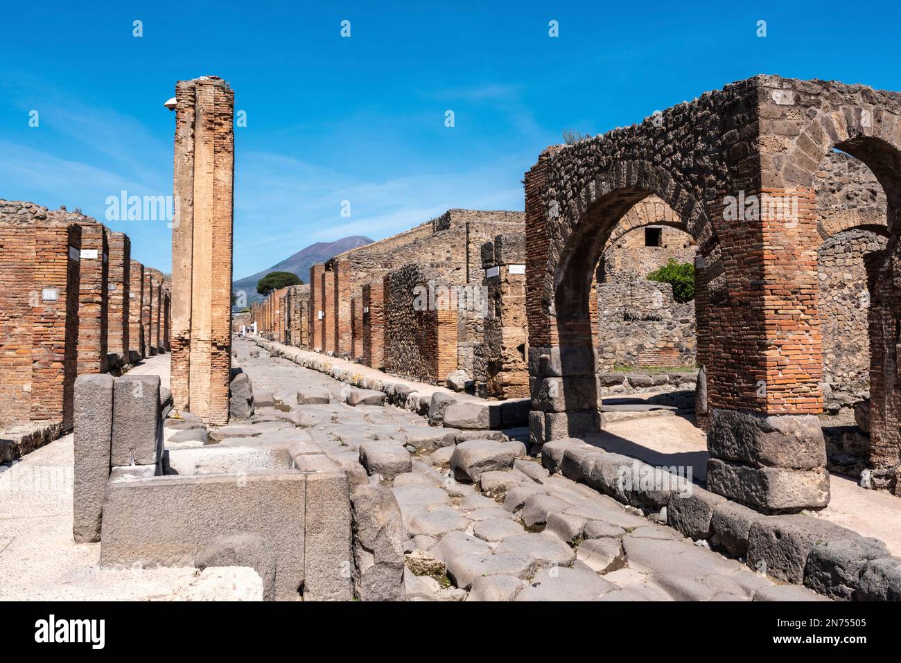 Pompeii, Italy, A crosswalk of a typical Roman road in the ancient city ...