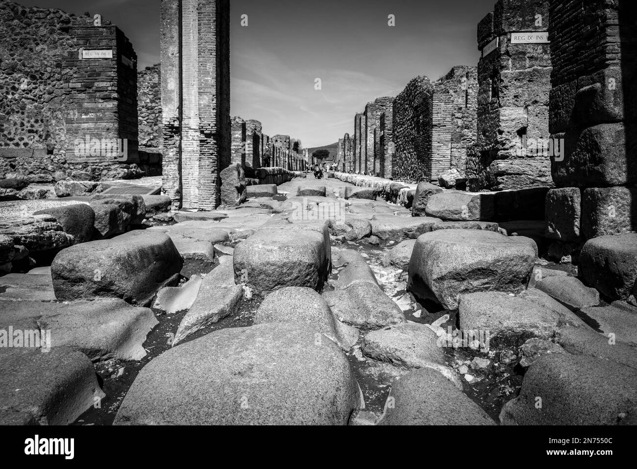 Pompeii, Italy, A crosswalk of a typical Roman road in the ancient city ...