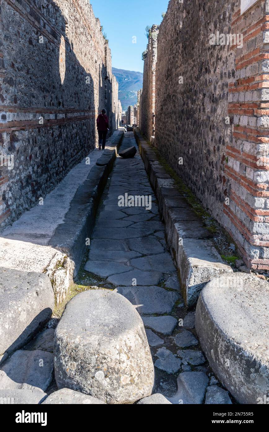 A crosswalk of a typical Roman road in the ancient city of Pompeii ...