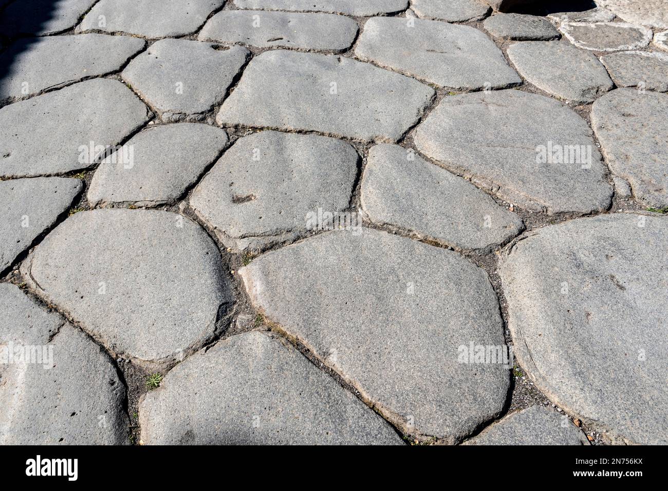 A beautiful typical cobbled street in an ancient roman city hi-res ...