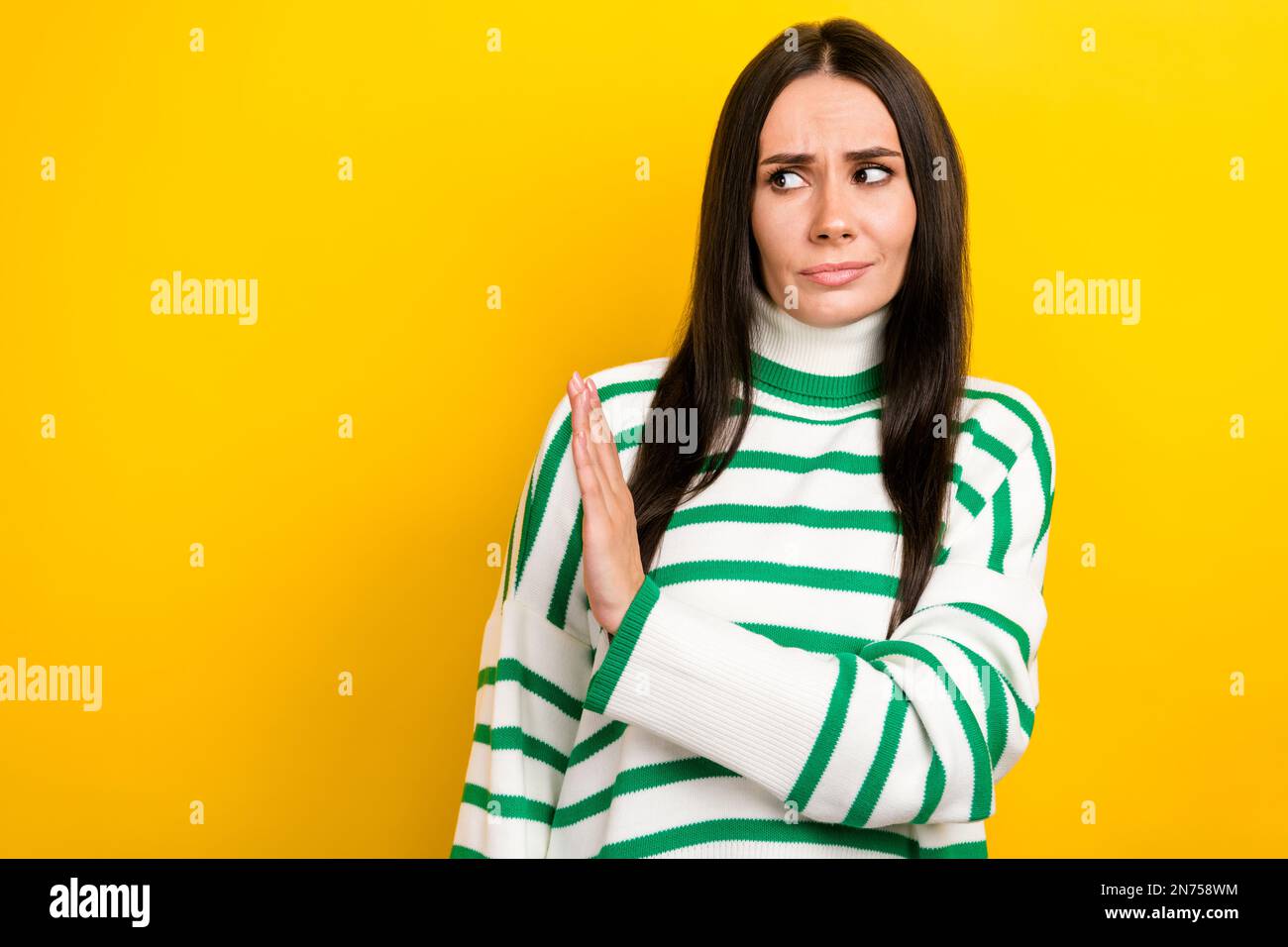 Photo of doubtful unsure lady dressed striped pullover rising arm palm ...