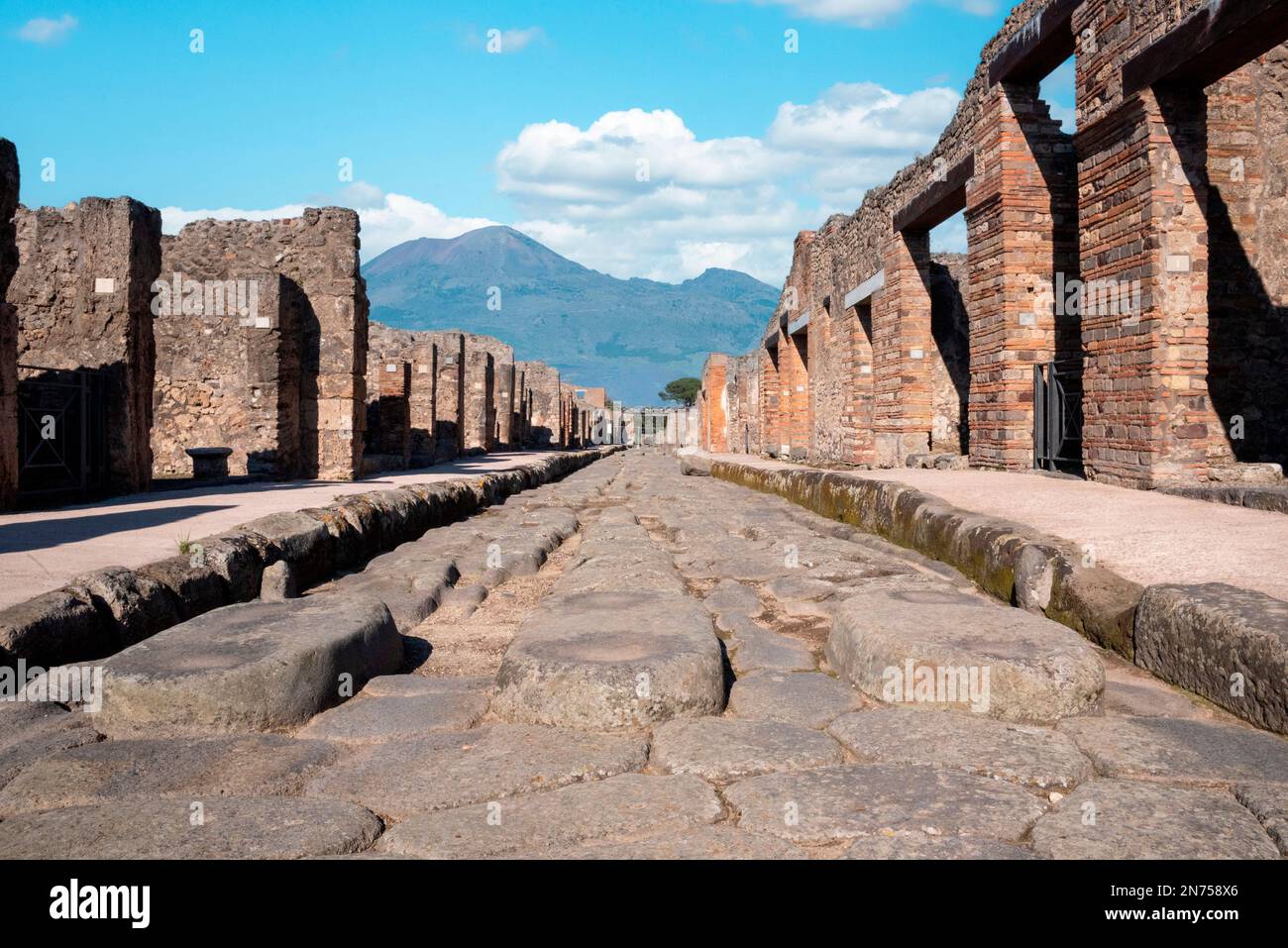 A crosswalk of a typical Roman road in the ancient city of Pompeii ...