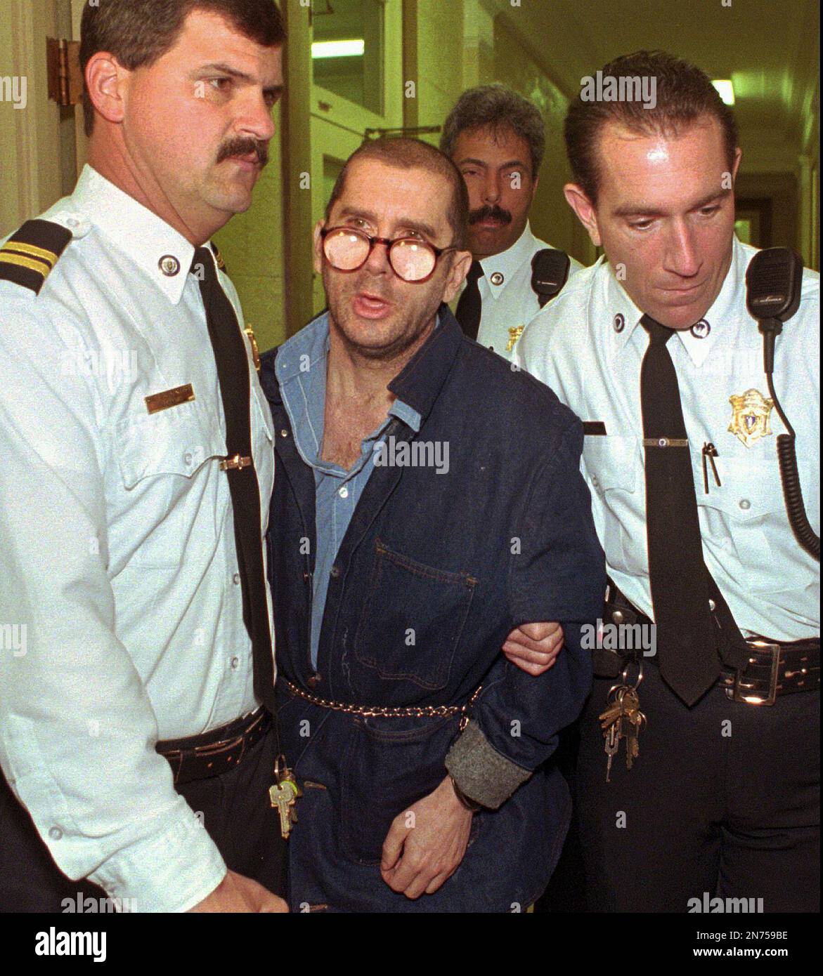 FILE - In this April 29, 1996 file photo, Lewis Lent Jr. is led from ...