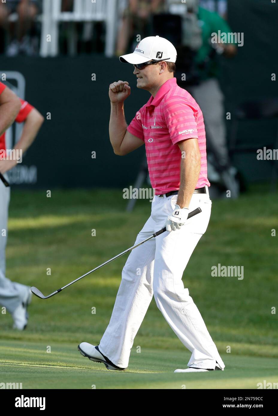 Zach Johnson reacts after missing a putt during a playoff in the John ...