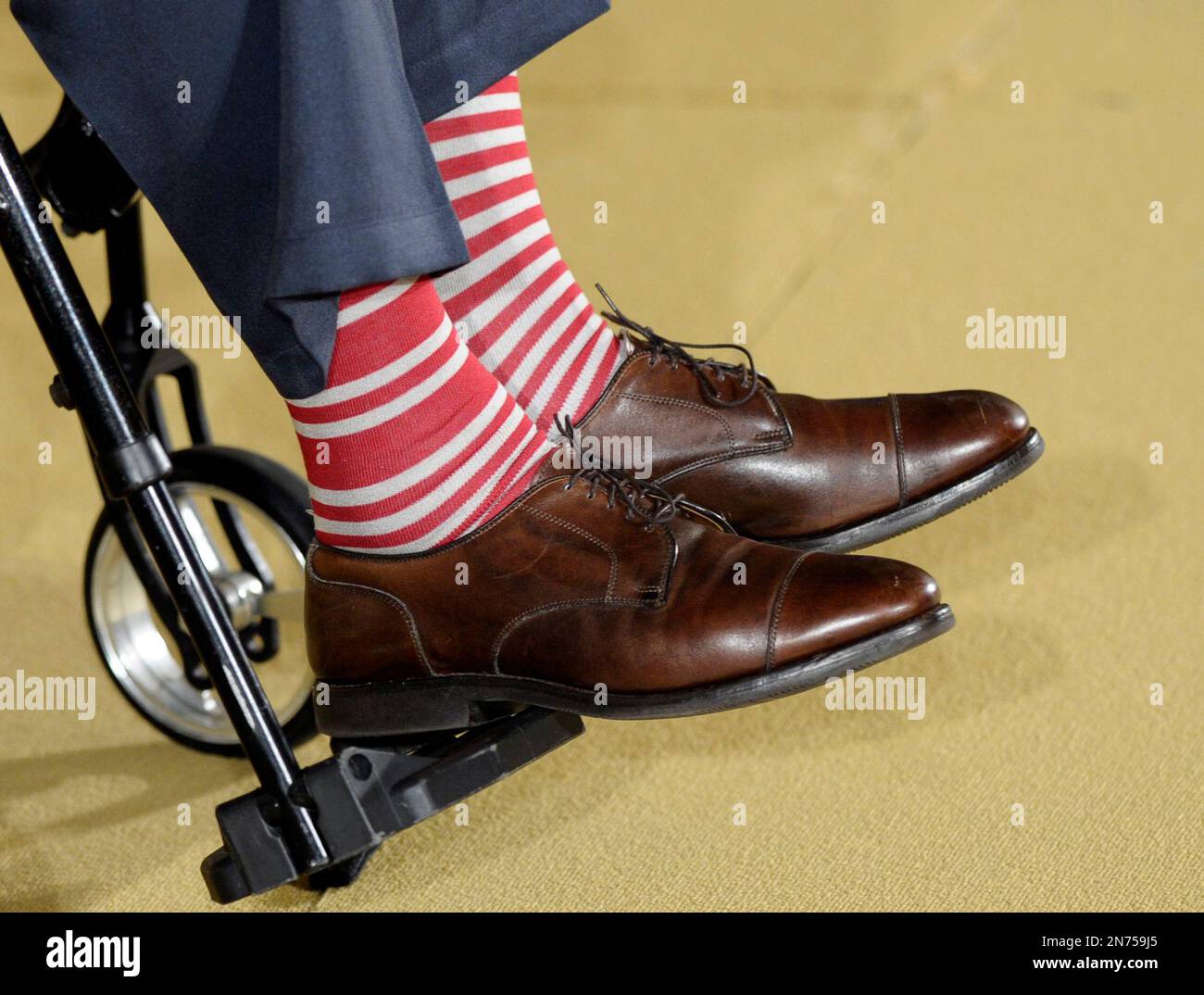 Former President George H. W. Bush, in a pair of red and white socks ...