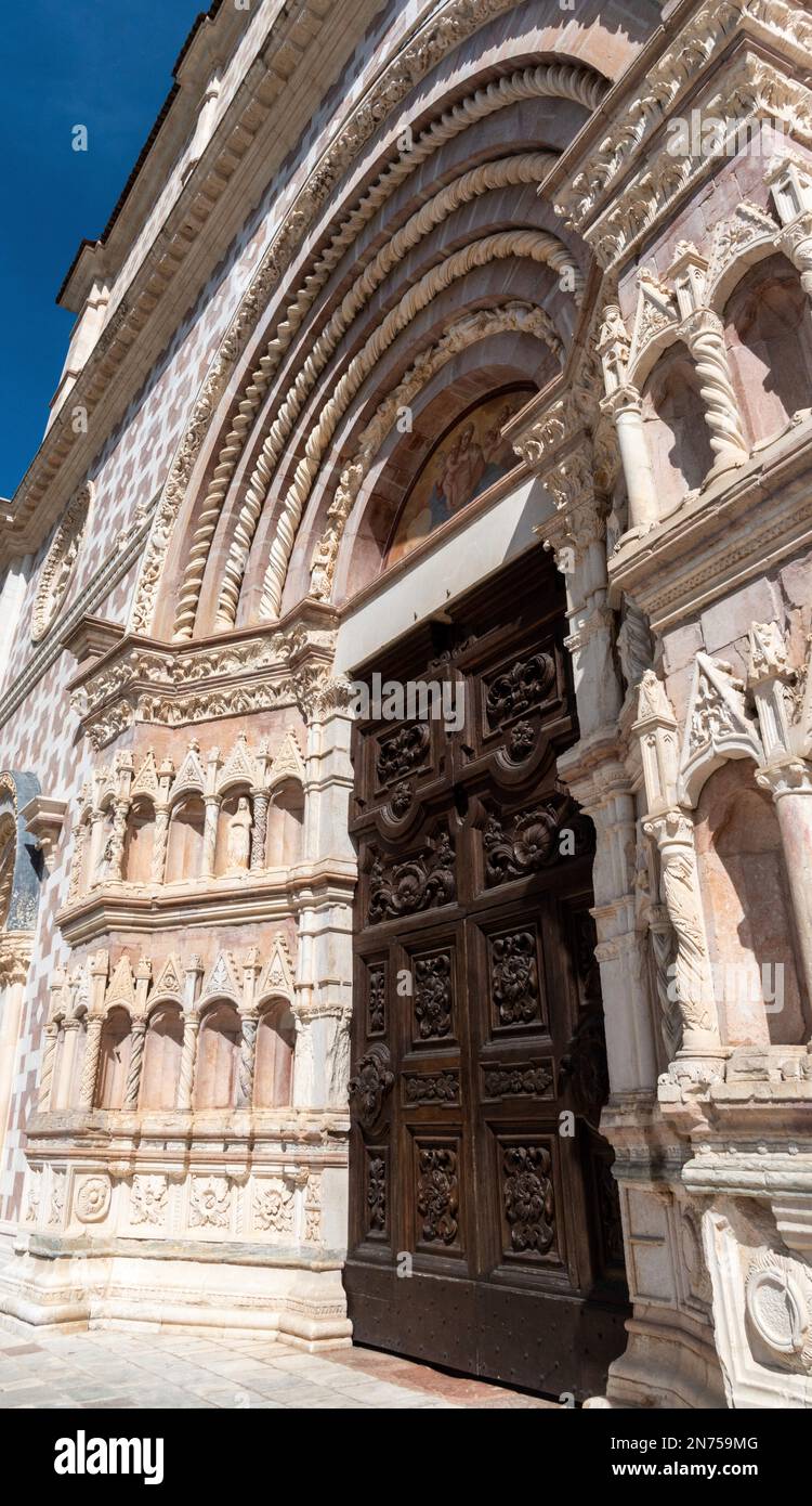 Ornate front gate of the rebuilt Romanesque basilica di Santa Maria di ...