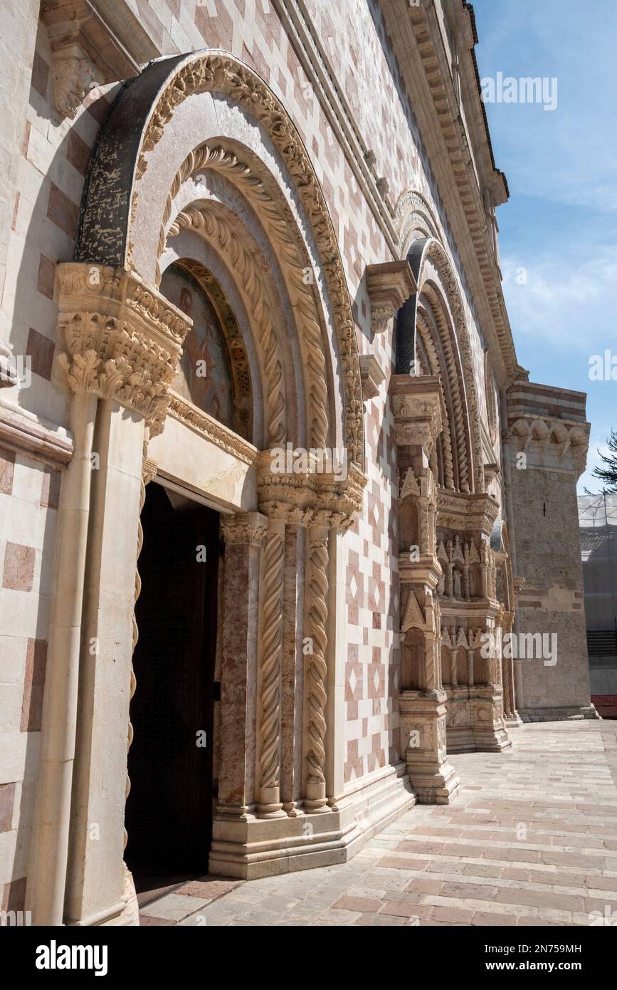 Ornate front gate of the rebuilt Romanesque basilica di Santa Maria di ...