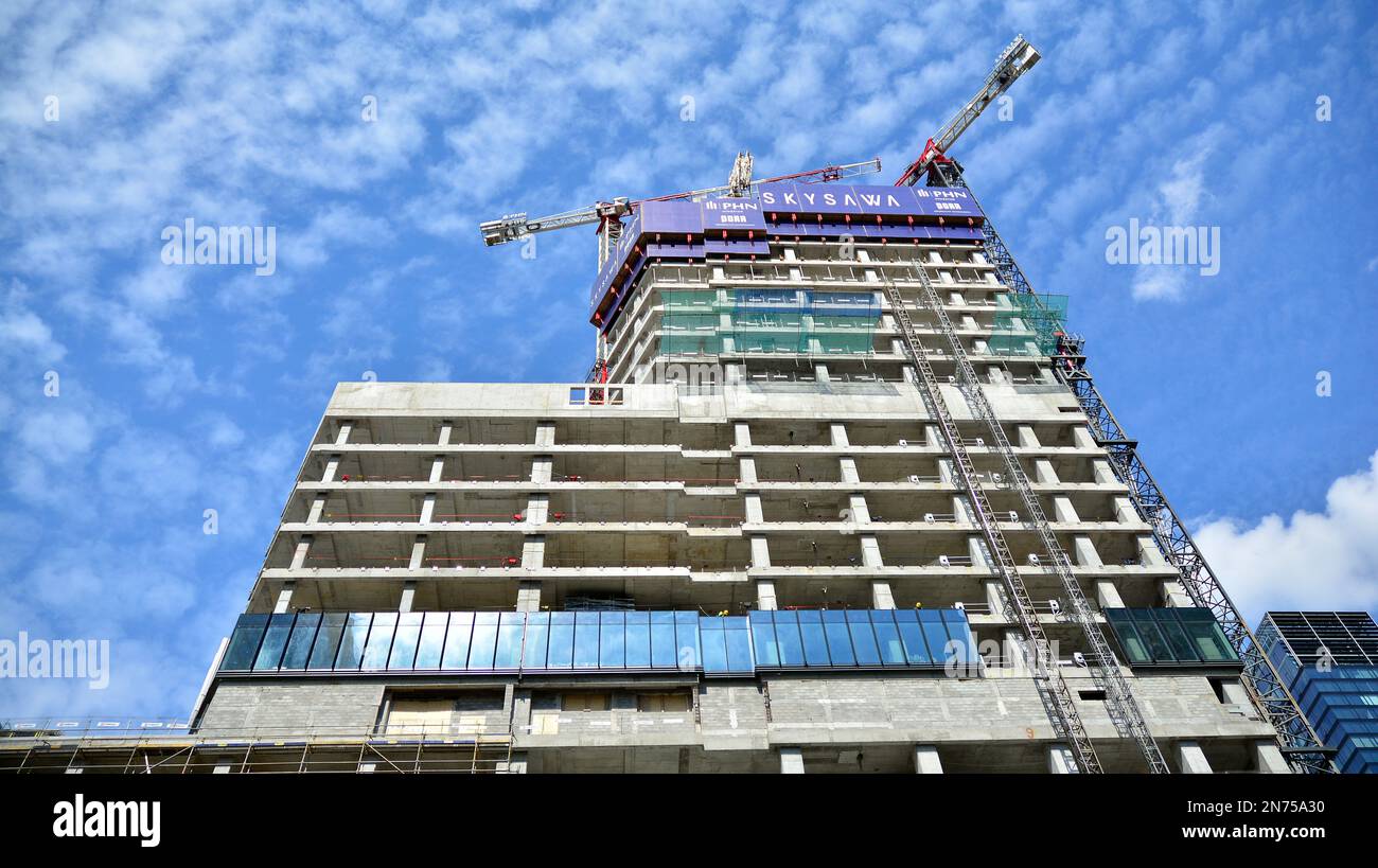 High-rise building under construction. Modern office building Stock ...