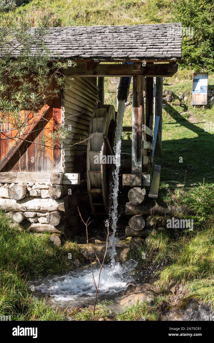 An old wooden watermill in Val di Morins, the Dolomite Alps of South ...
