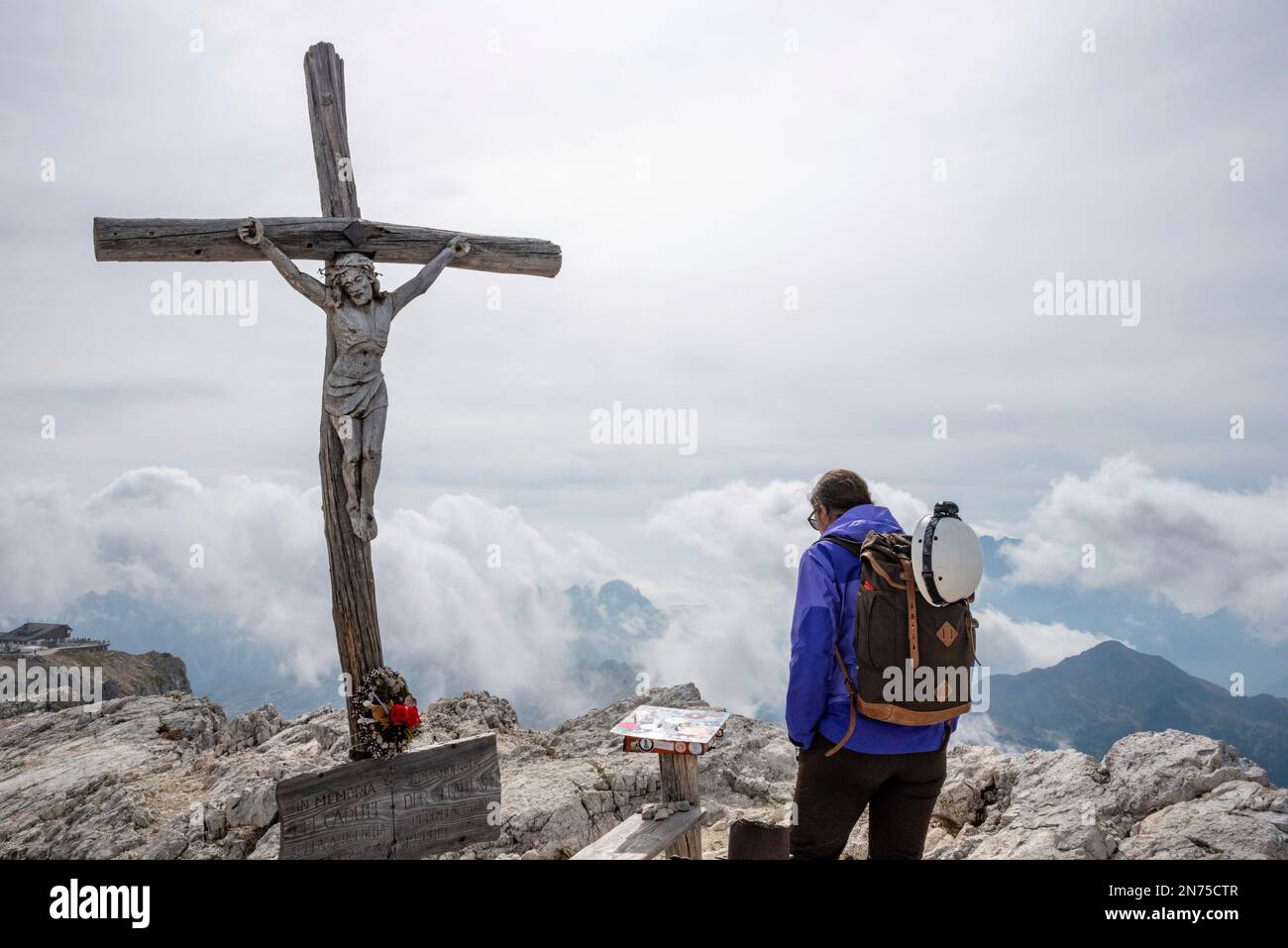 The beautiful old wooden summit cross of Mount Lagazuoi in the Dolomite ...
