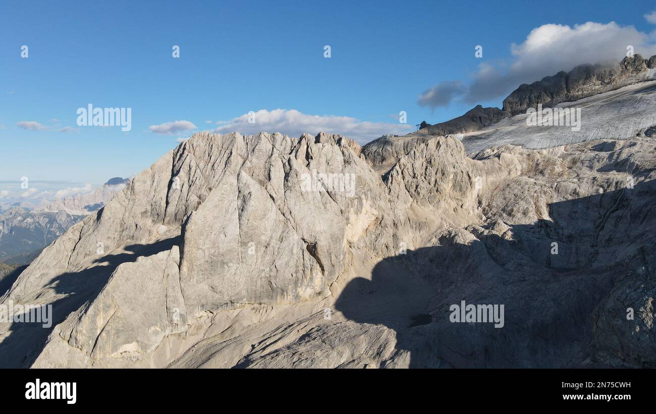 An aerial of the Marmolada mountain peak of the Dolomites range in ...