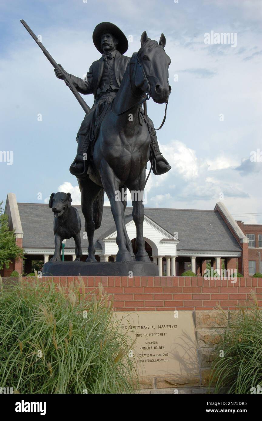 In a Wednesday, July 10, 2013, photo a statue of U.S. Deputy Marshal ...