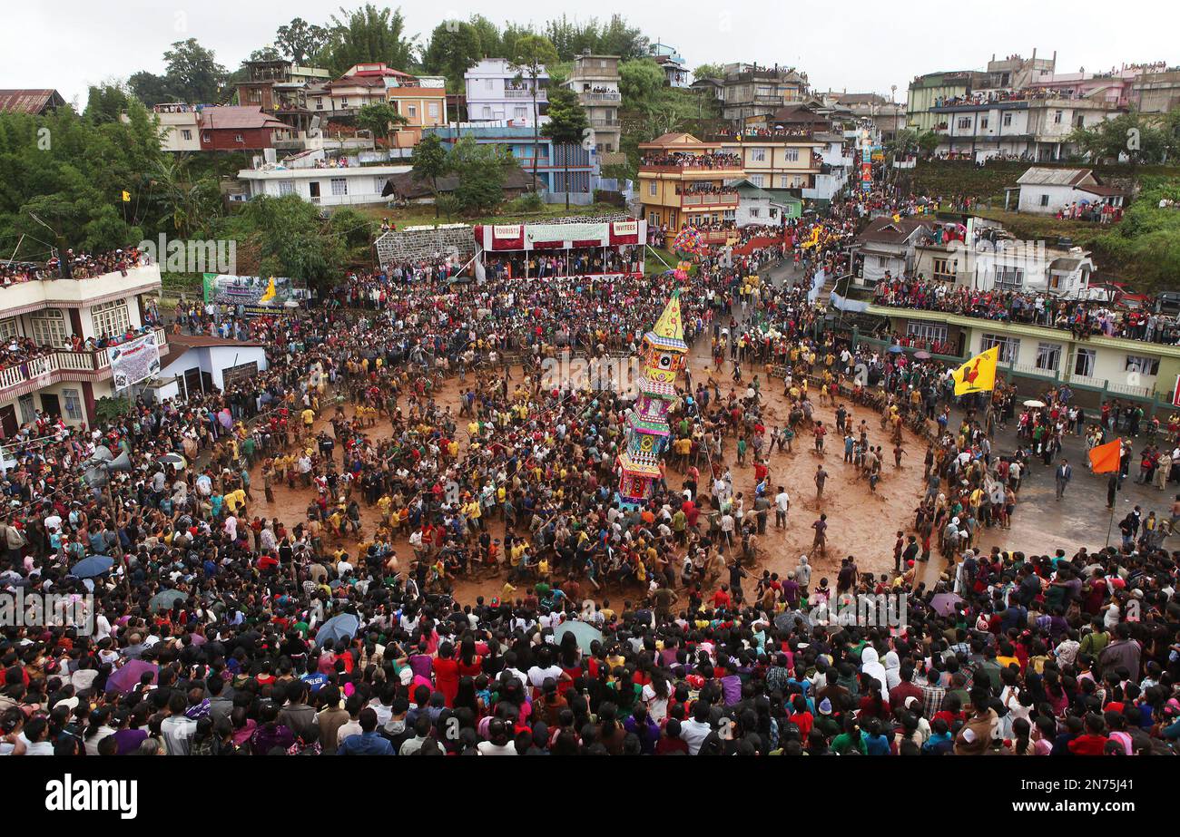 Jaintia tribesmen carry a 'Rath' or chariot during the celebration of ...