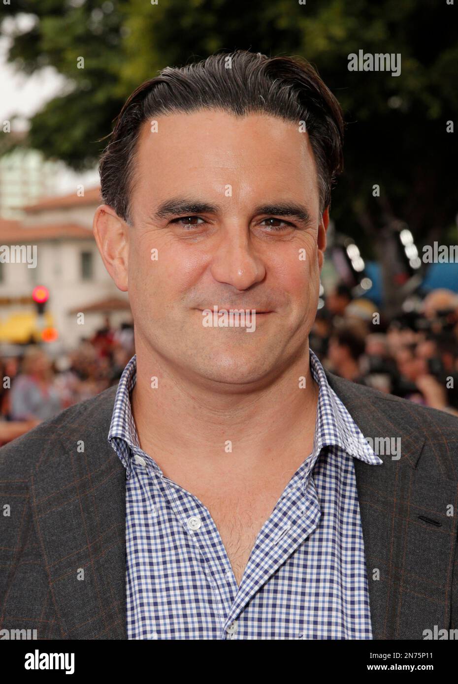 Producer Mark Vahradian arrives on the red carpet at the LA premiere of ...