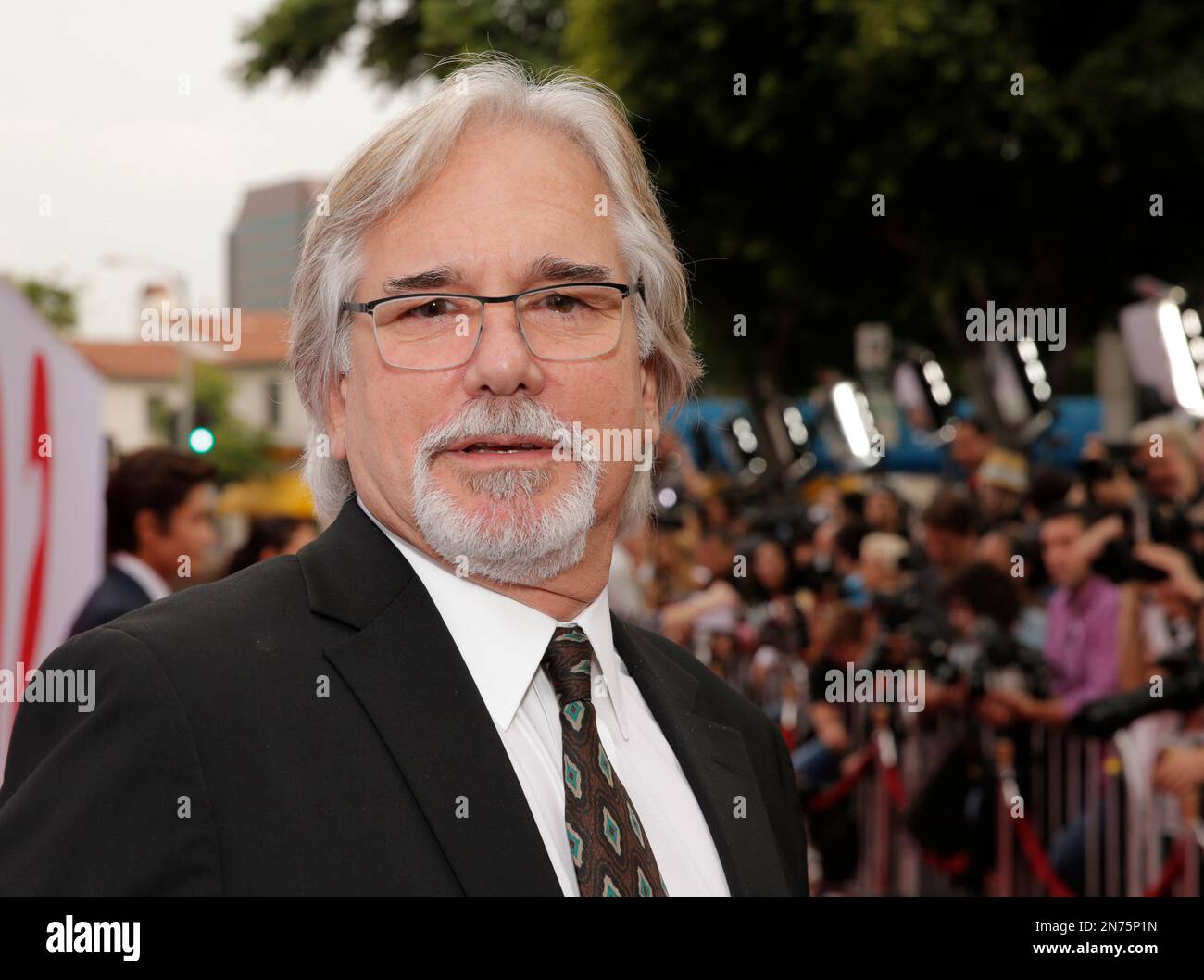Director Dean Parisot arrives on the red carpet at the LA premiere of ...