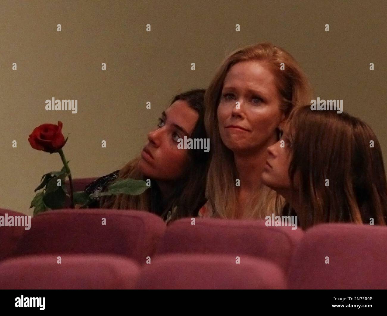 Church members Bobbie Candler-Buyalos hugs her daughters: Erica Buyalos ...