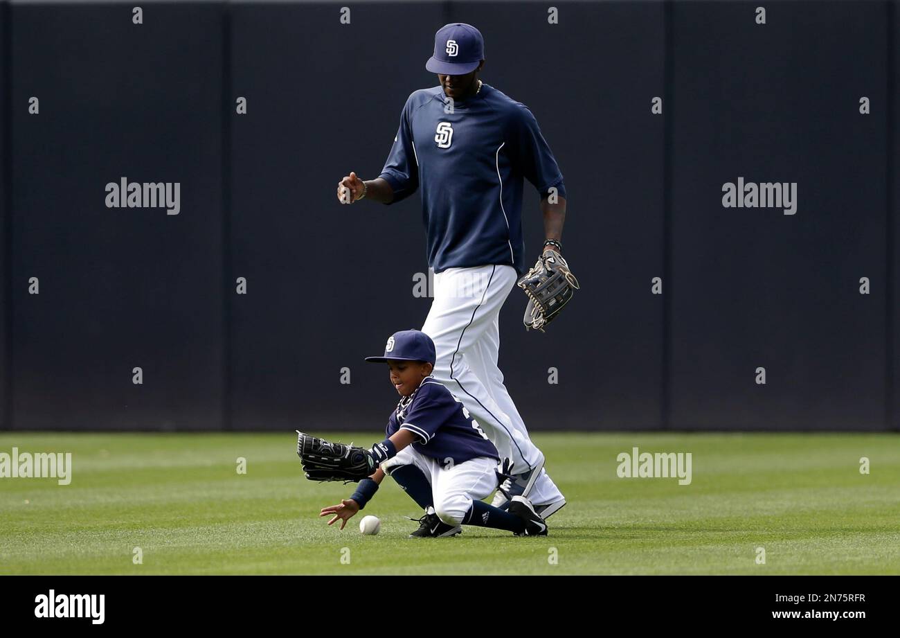 San Diego Padres center fielder Cameron Maybin, above, looks on as his ...