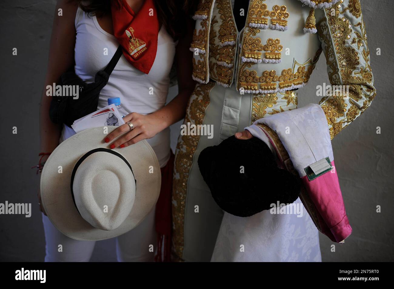 Spanish bullfighter David Mora, right, holds his ''montera'' beside a ...