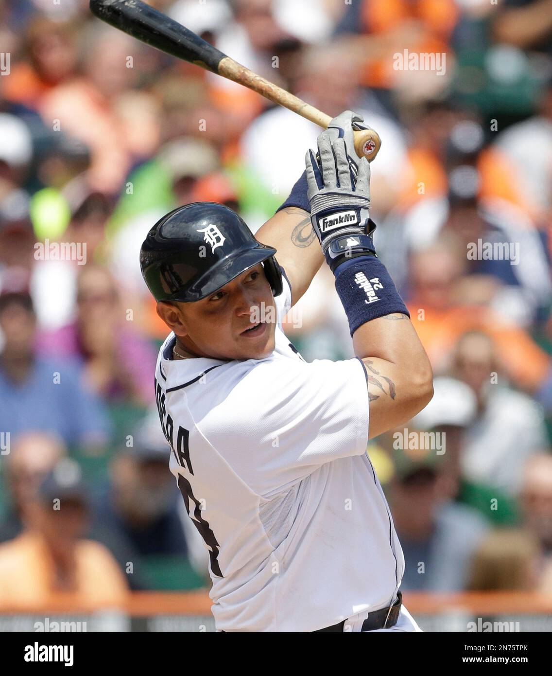 Detroit Tigers' Miguel Cabrera watches the path of his solo home run ...